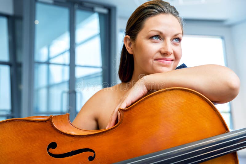 Woman with a cello stock image. Image of beautiful, playing - 132207993