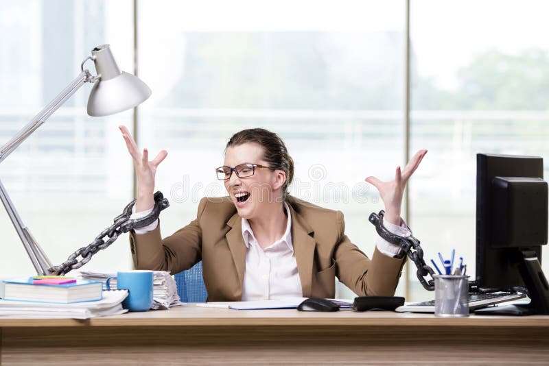 The Woman Chained To Her Working Desk Stock Photo - Image of chain ...