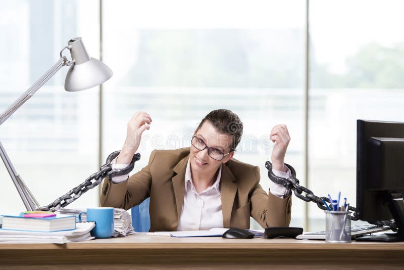 The Woman Chained To Her Working Desk Stock Photo - Image of chain ...