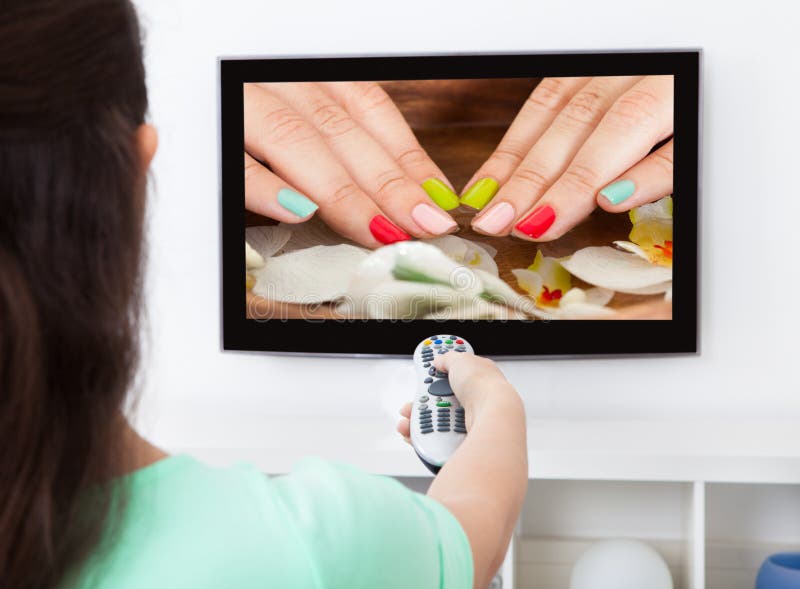Woman Changing Television Channel Stock Image - Image of plasma, color ...