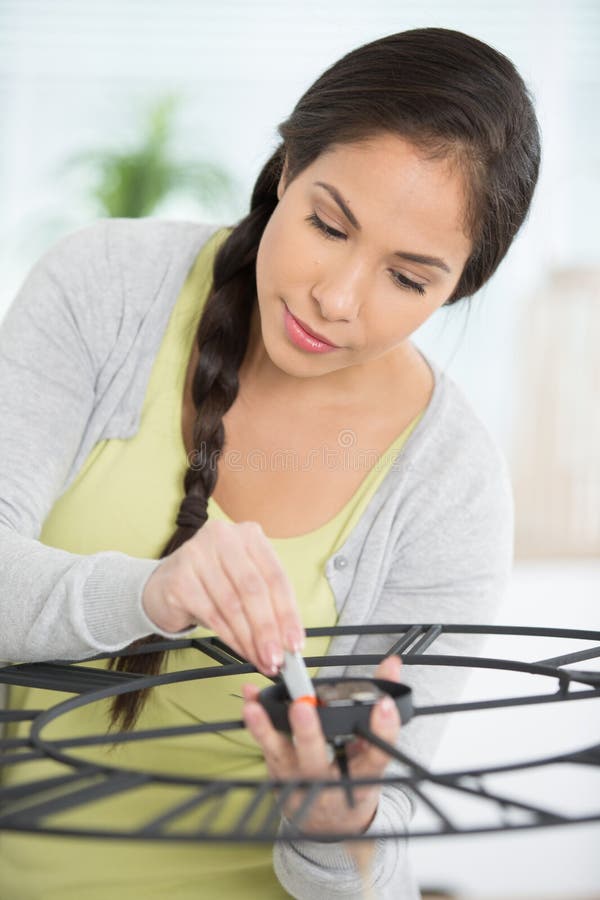 Woman changing time clock stock photo. Image of beret - 283607472