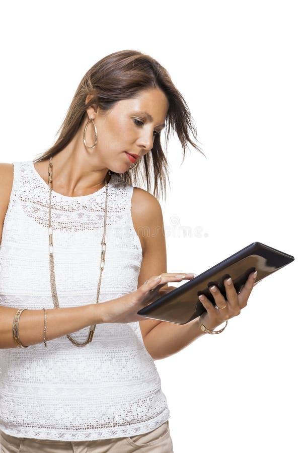 Woman Chatting on a Mobile while Reading a Tablet Stock Image - Image ...
