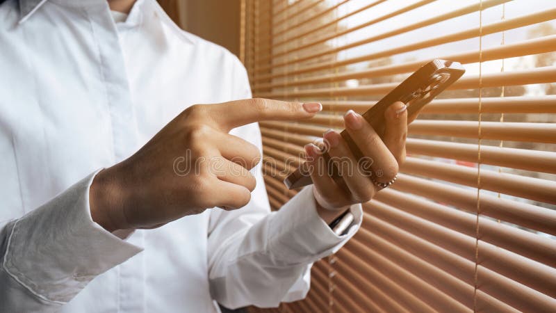 Woman Chatting Online on Smartphone Touching Touchscreen Keyboard ...