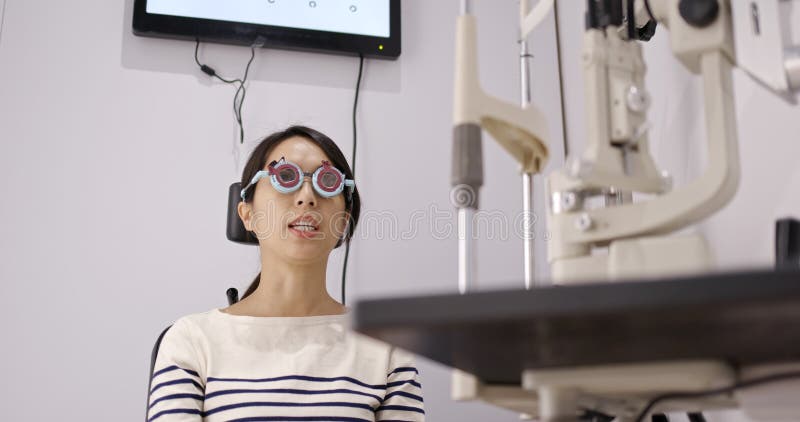 Woman check on eye stock photo. Image of oculist, optometrist - 141961484