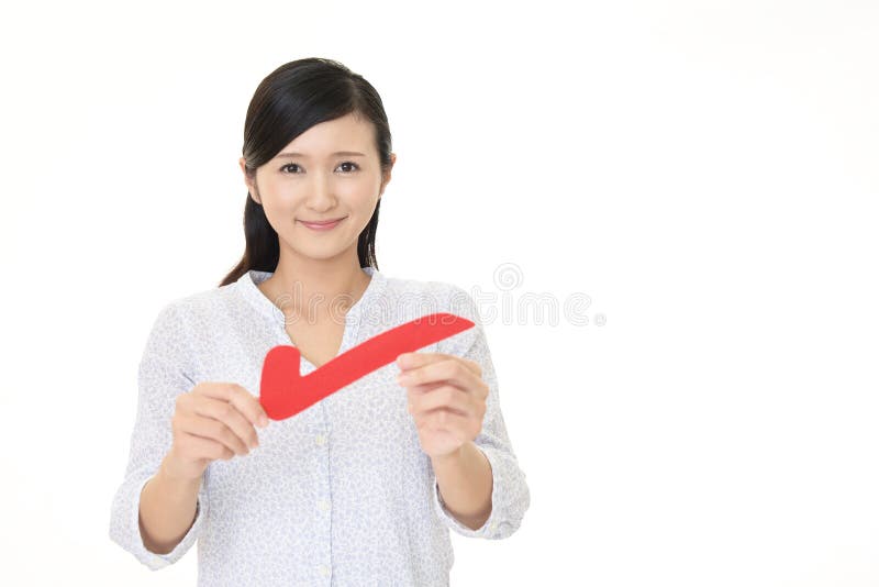 Woman with a check mark stock image. Image of mark, female - 135437051