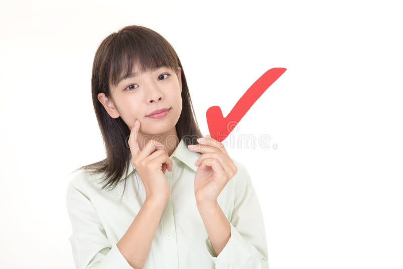 Woman with a check mark stock photo. Image of japan - 139223544