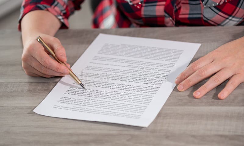 Woman checking a document stock image. Image of check - 191698883