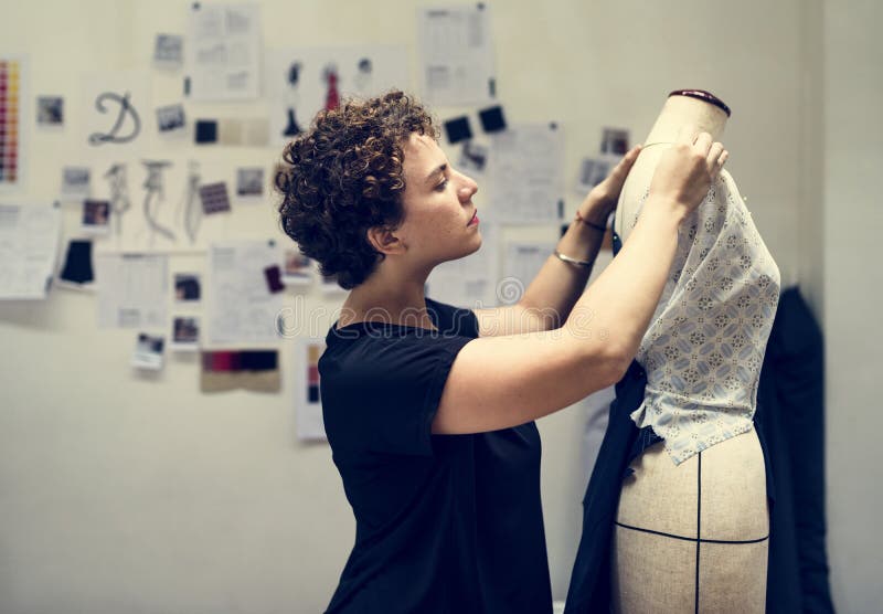 Woman checking on a dress stock image. Image of wear - 116946437