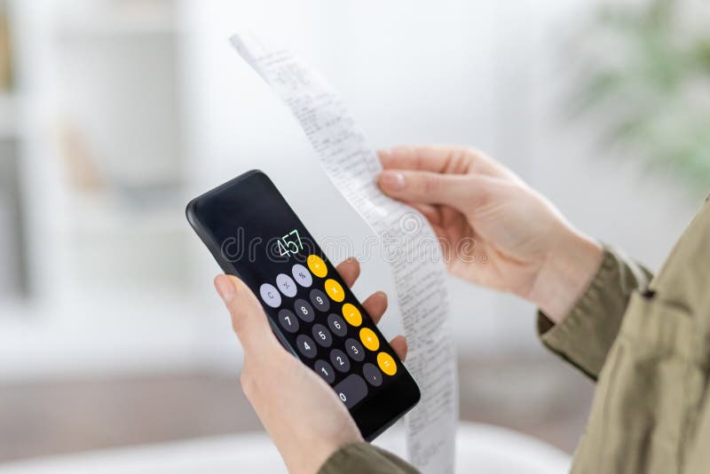 Woman Checking Expenses with Calculator and Receipt at Home Stock Image ...