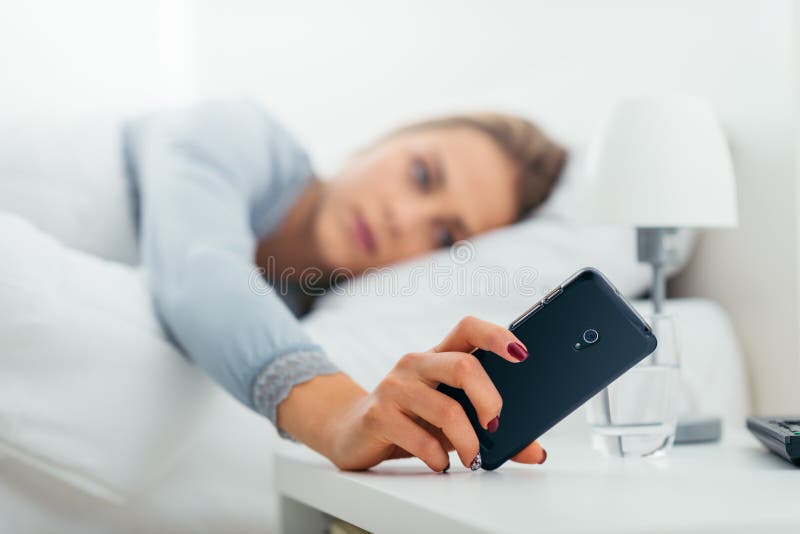 Woman checking her phone stock photo. Image of comfortable - 81727358