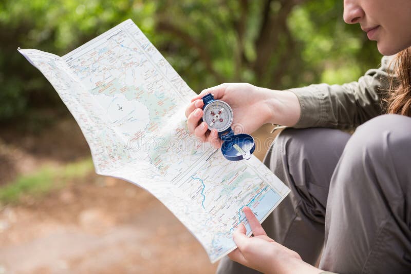 Woman Checking Map and Compass Stock Image - Image of orientation ...