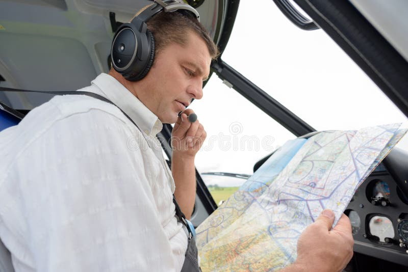 Woman Checking Map in Tarmac Stock Photo - Image of professional, cabin ...