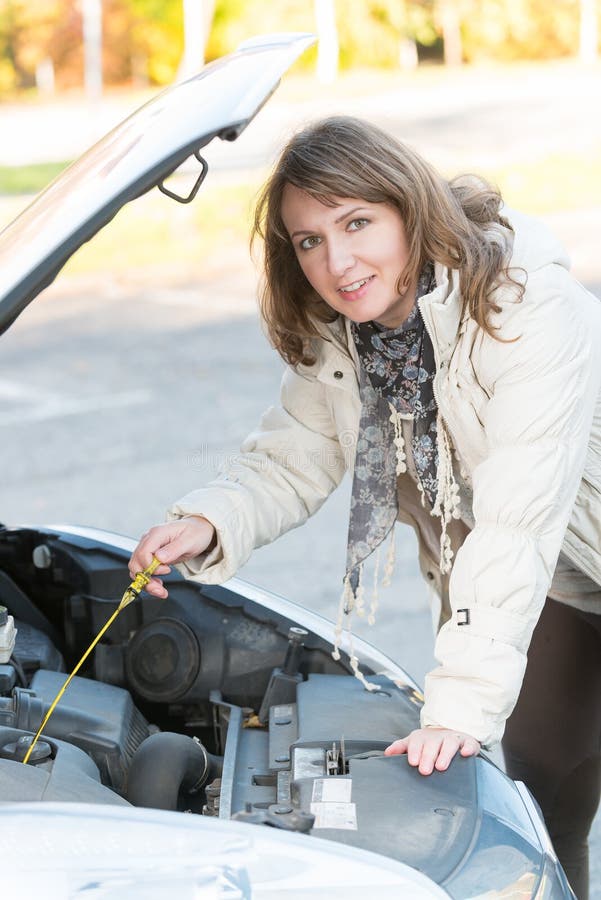 Woman Pouring Oil into Car Engine Stock Image - Image of funnel ...