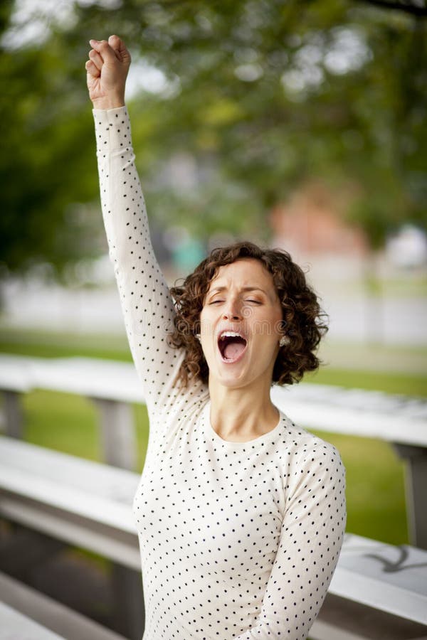 Woman Cheering at the Park stock image. Image of freedom - 47006839