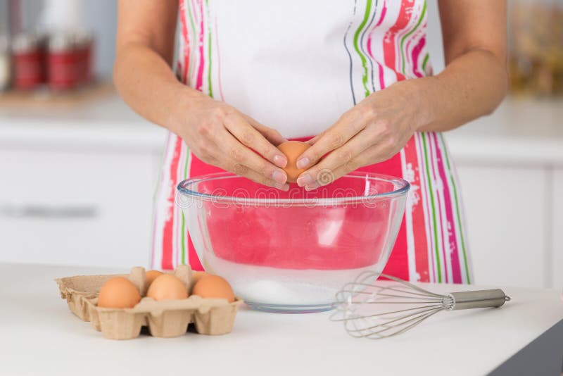 Woman Chef or Cook Breaking Egg into Kitchen Mixing Bowl Stock Image ...
