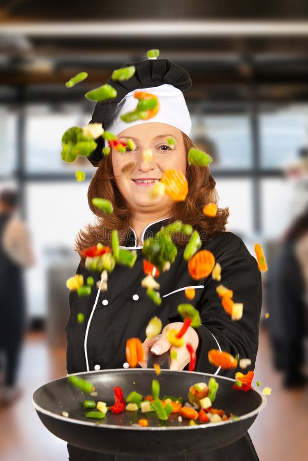 Woman Chef Tossing Vegetables Stock Photo - Image of female, throwing ...