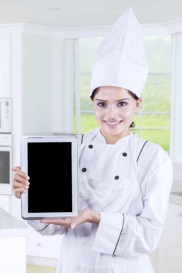 Woman with Chef Uniform Showing Tablet Stock Image - Image of ...