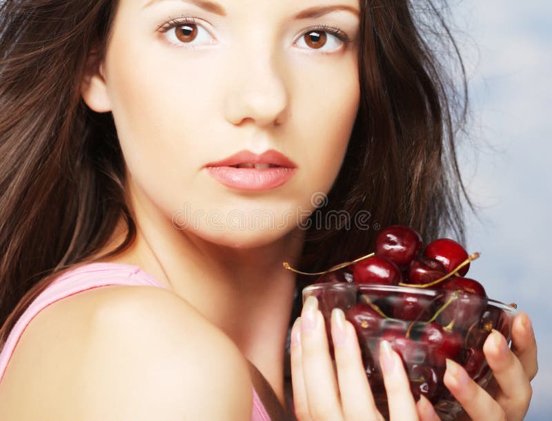 Woman with Cherries Over White Stock Photo - Image of brunette, hungry ...