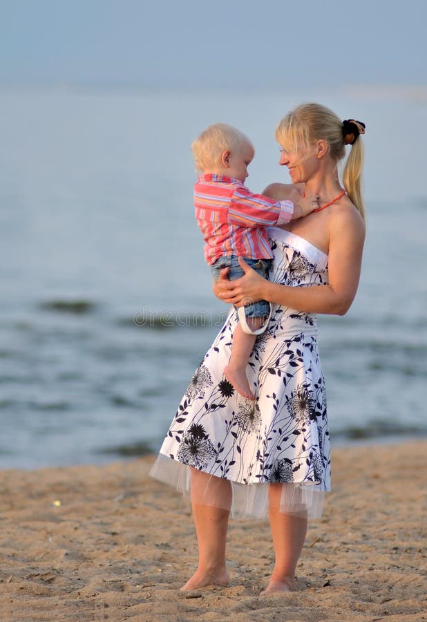 Woman with child stock image. Image of white, sunset - 21817245