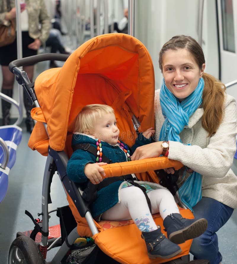 Woman with Child in Stroller at Metro Stock Photo - Image of girl ...