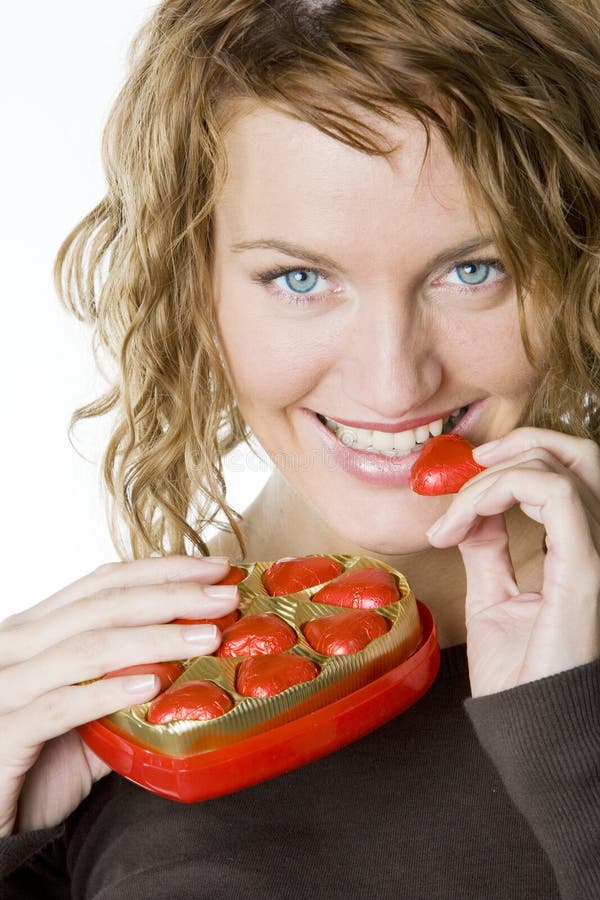 Woman with chocolate box stock image. Image of love, eating - 22863287