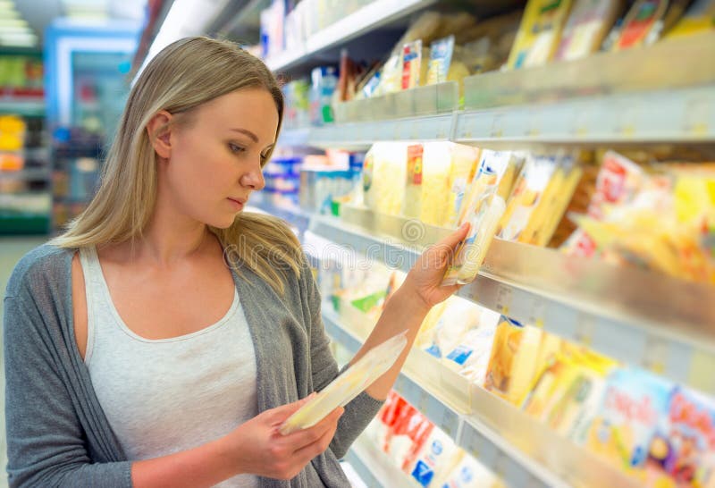 Woman choosing cheese. Ingredients, piece. | Stock Images Page | Everypixel