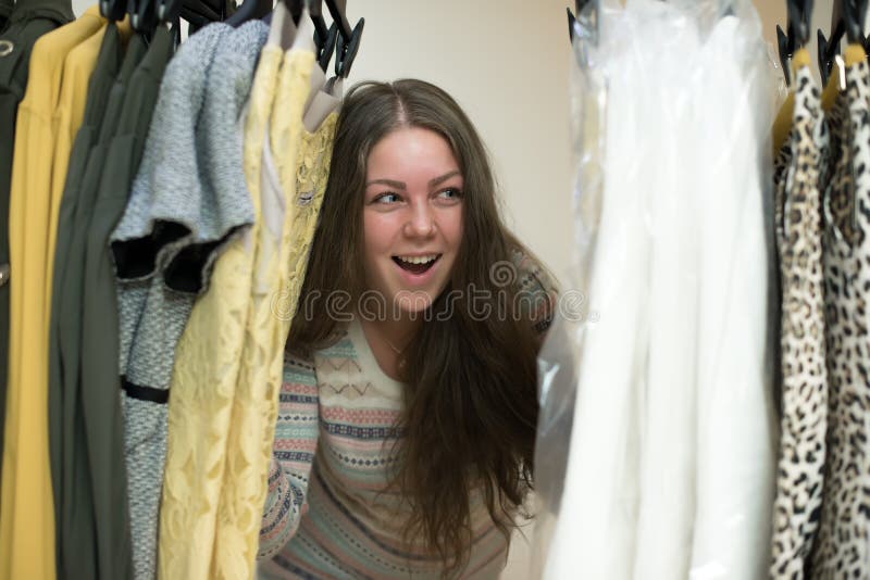 Woman choosing clothes stock image. Image of cloth, cheerful - 37896647