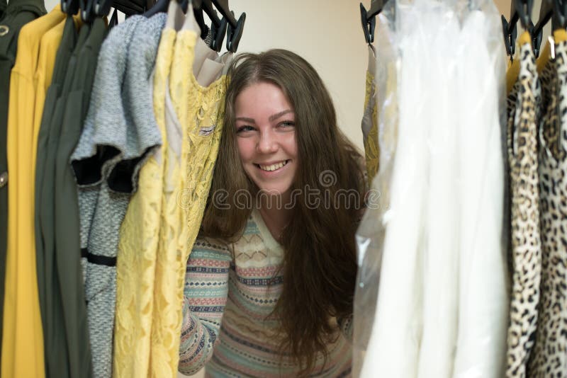 Woman choosing clothes stock image. Image of housework - 37896691