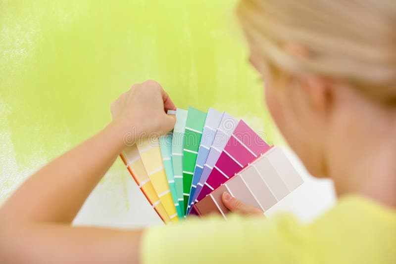 Woman Choosing Color for Wall Stock Photo - Image of painters, home ...