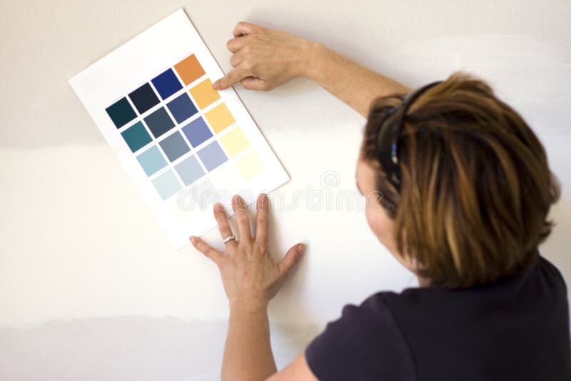 Woman Choosing Paint Color for Wall Stock Image - Image of colour ...