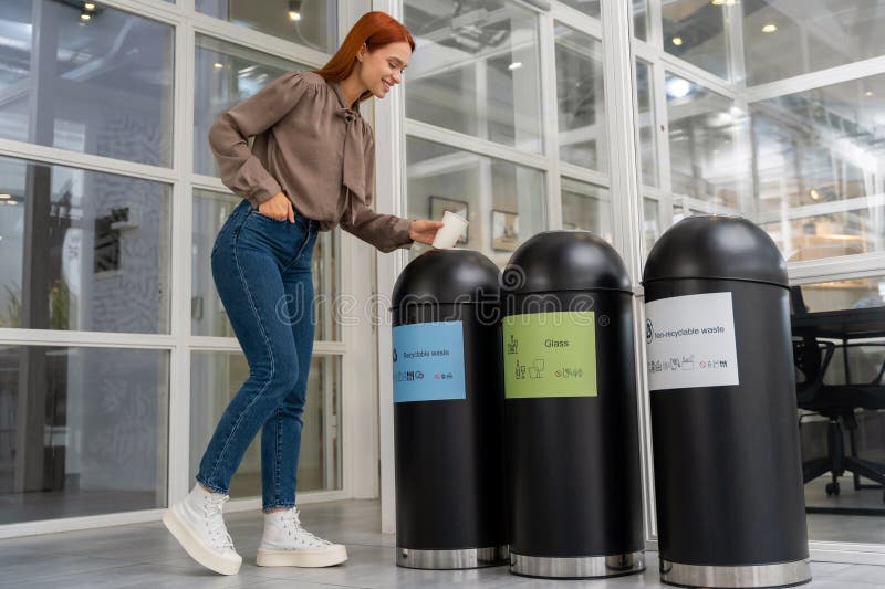 Woman Choosing a Proper Container for Throwing Paper Cup Stock Photo ...