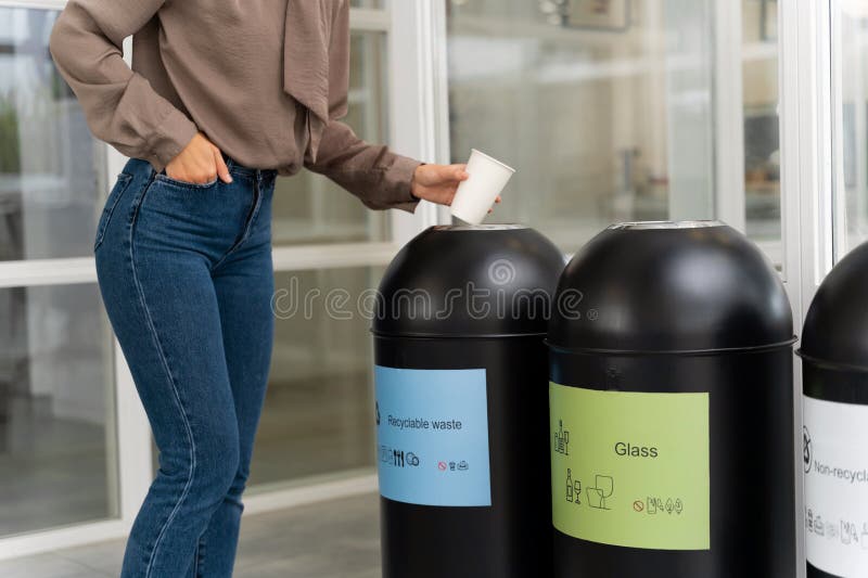 Woman Choosing a Proper Container for Throwing Paper Cup Stock Photo ...