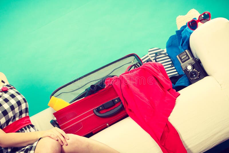 Woman Choosing Things To Pack into Suitcase Stock Image - Image of ...