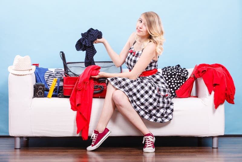 Woman Choosing Things To Pack into Suitcase Stock Image - Image of ...