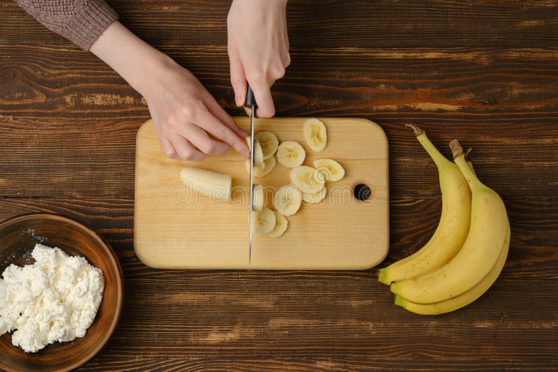 Woman Chopping Banana for Making Smoothie Bowl Stock Image - Image of ...