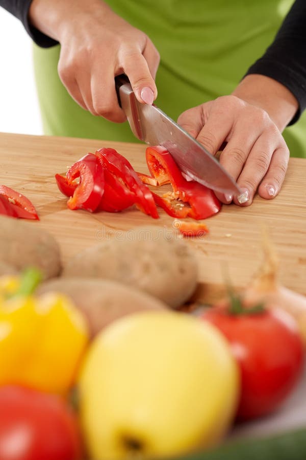 Woman chopping vegetables stock photo. Image of fresh - 136693376