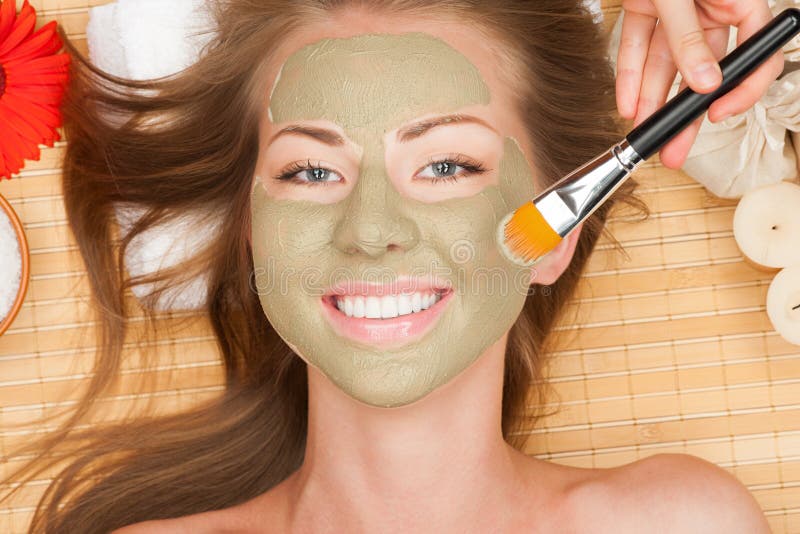 Woman with Clay Facial Mask Stock Image - Image of beauty, face: 20256693