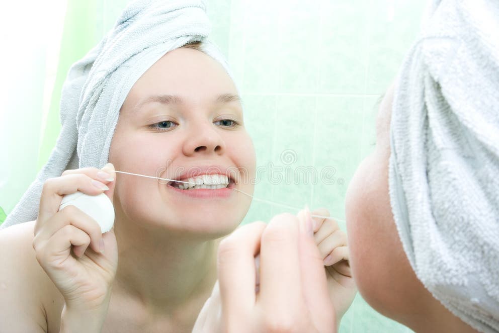 Woman clean teeth thread stock image. Image of body, indoor - 3044651