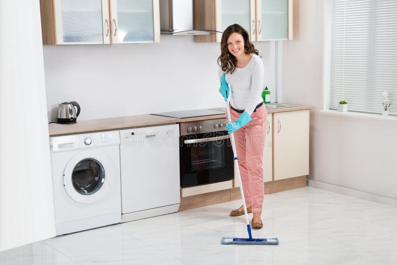 Woman Cleaning Floor with Mop Stock Photo - Image of holding, casual ...