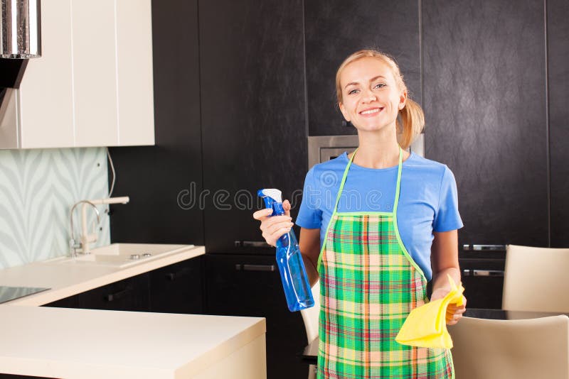 Woman cleaning kitchen stock photo. Image of caucasian - 31093520