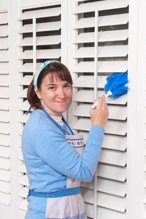 Woman Dusting Window Shutters Stock Photos - Free & Royalty-Free Stock ...