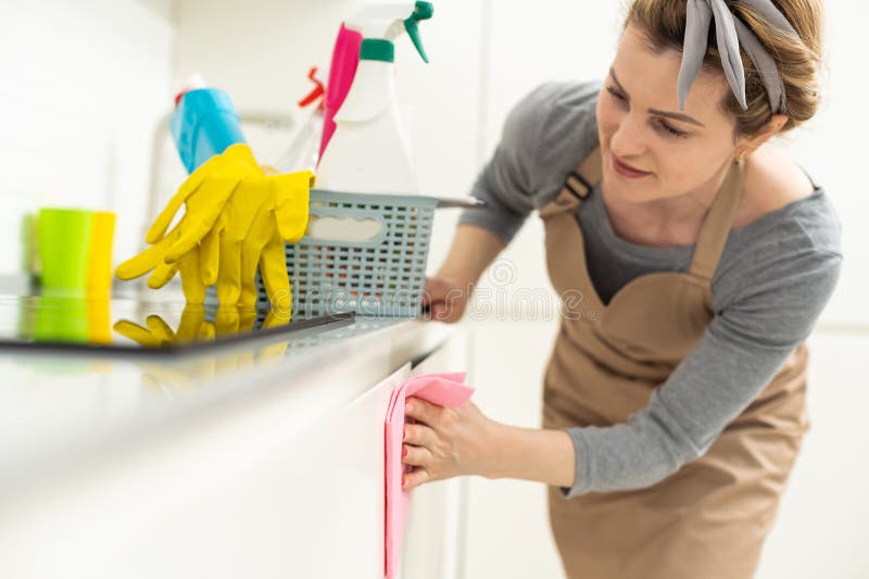 Woman Cleaning Table Using Rag and Diffuser at Home. Stock Image ...