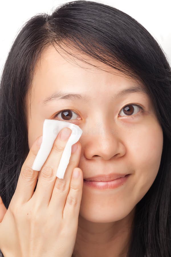 Woman cleansing face stock photo. Image of cotton, cheek - 34588386