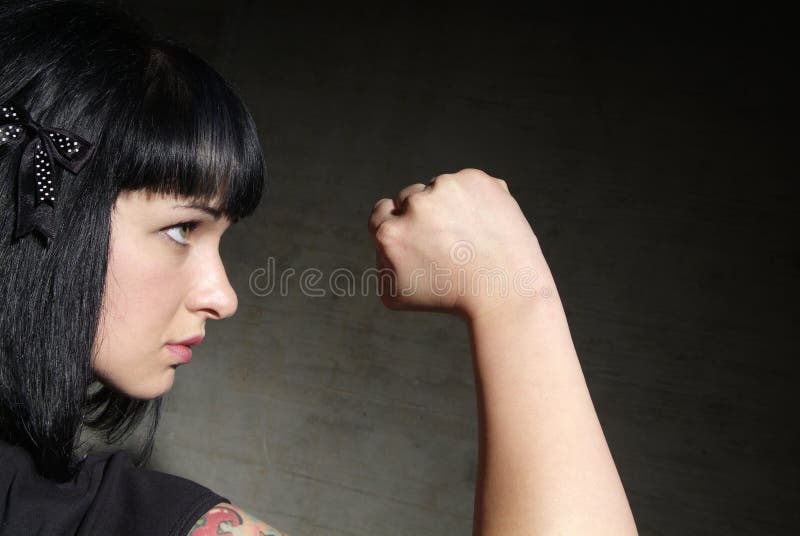 Woman clenches fist stock image. Image of perky, finger - 5576275