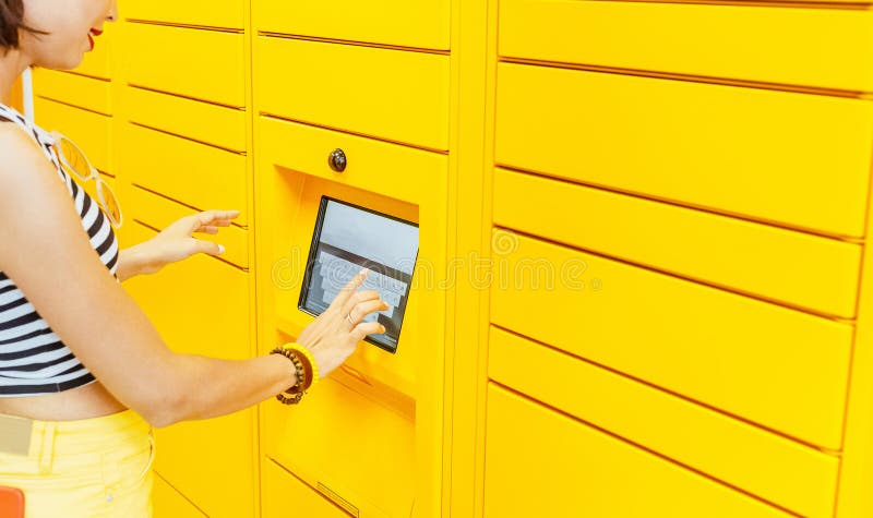 Client Using Automated Self Service Post Terminal Machine or Locker To ...