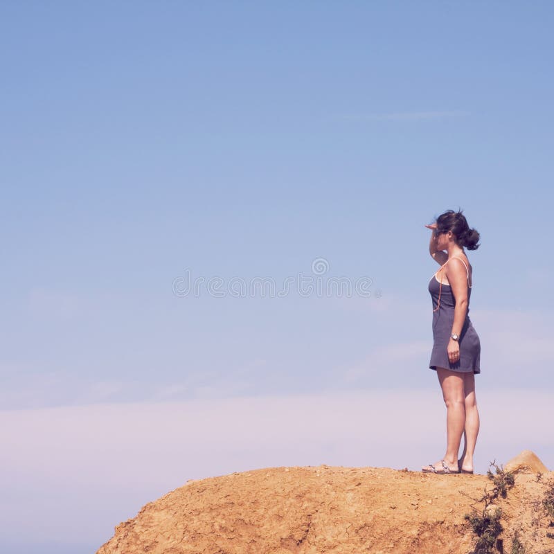 Woman at the cliff stock image. Image of scenics, achievement - 40382855