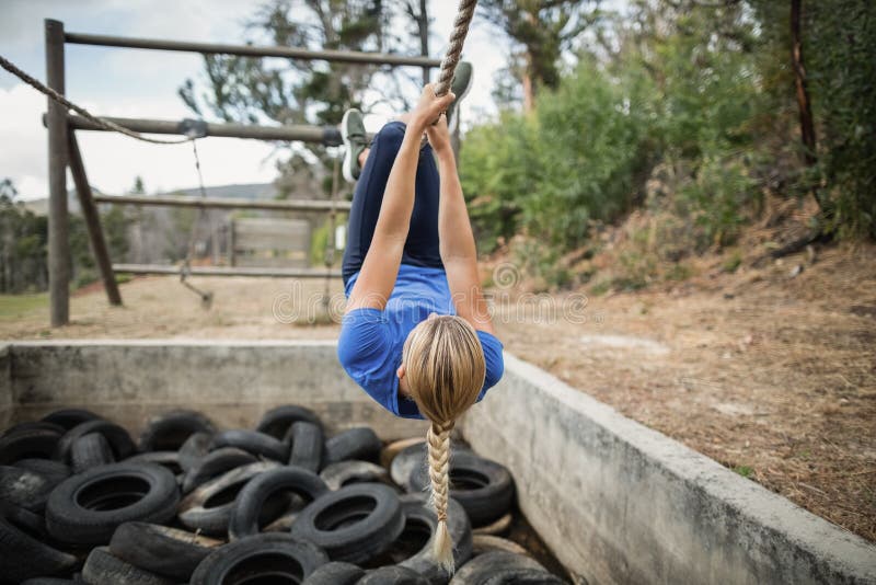 Woman Climbing Rope during Obstacle Course Training Stock Image - Image ...