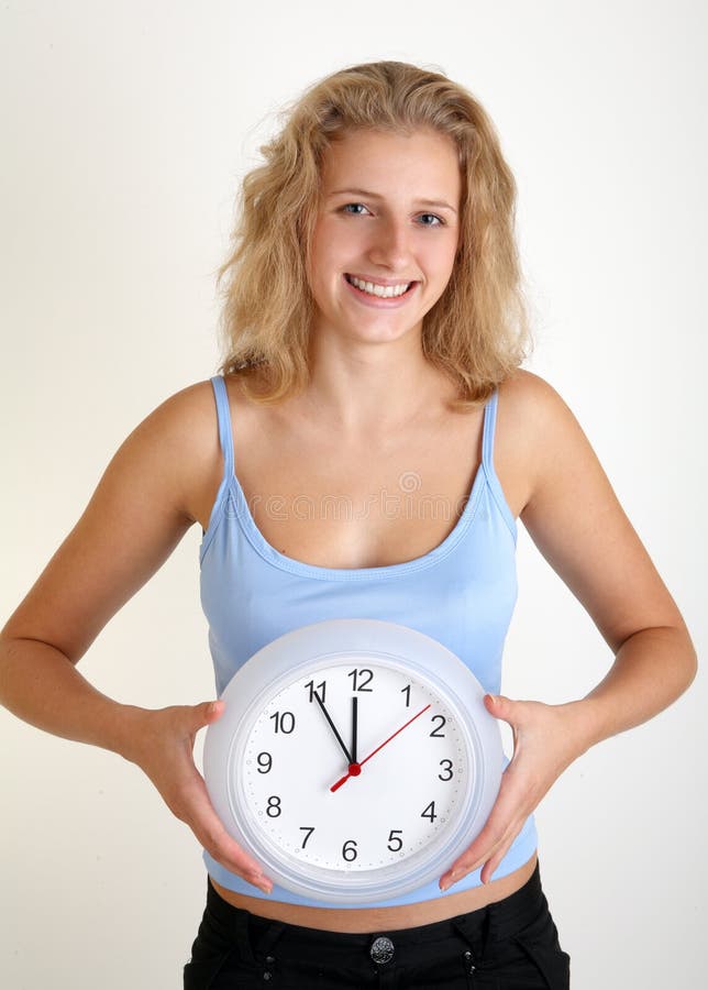 Woman with a clock stock photo. Image of office, clock - 6951586
