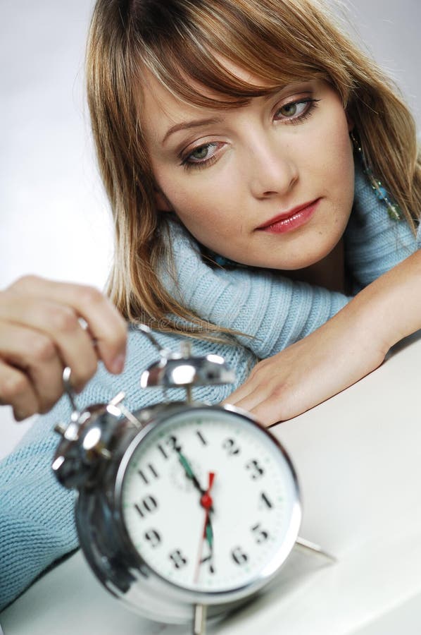 Woman with clock stock image. Image of sleep, fatigue - 3020633