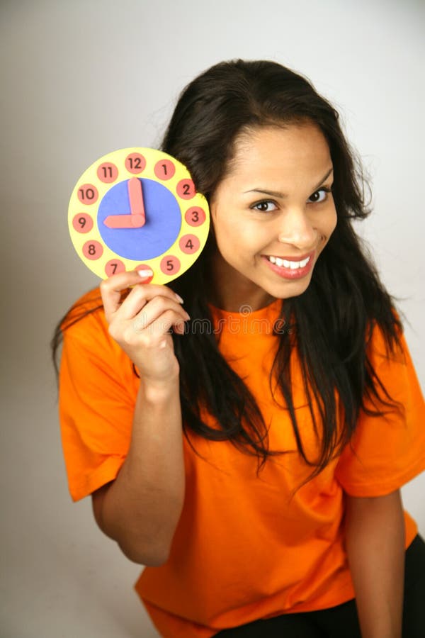 Woman with a clock stock image. Image of woman, look, enticing - 4320767
